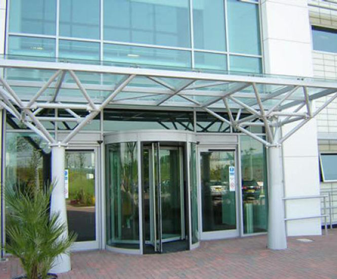 Bolted framed glass entrance canopy | Clovis Canopies