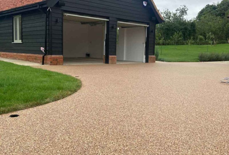Porous resin bound surfacing for sloping driveway | Images