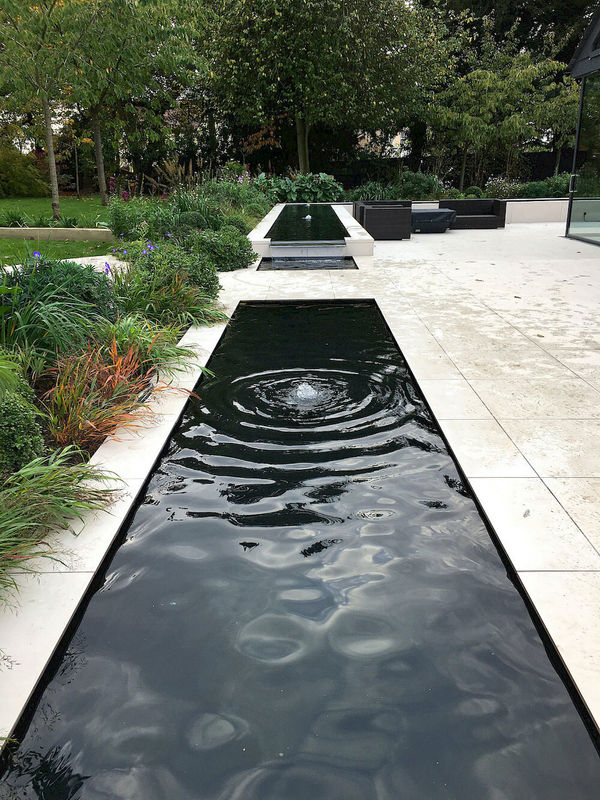 Reflection pools with fountains for private home | Images