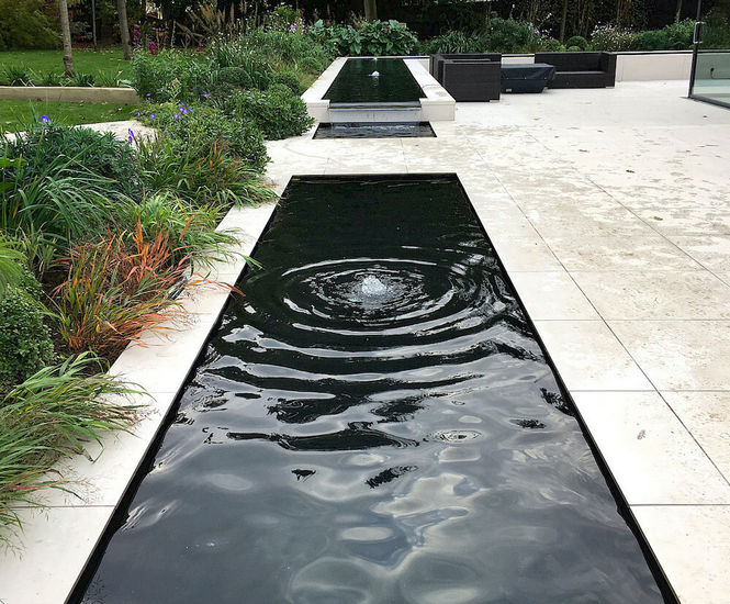 Reflection pools with fountains for private home | Tills Innovations