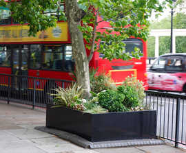 Bespoke steel tree planters for Park Lane hotel | IOTA | ESI External Works
