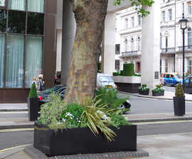 Bespoke steel tree planters for Park Lane hotel | IOTA | ESI External Works