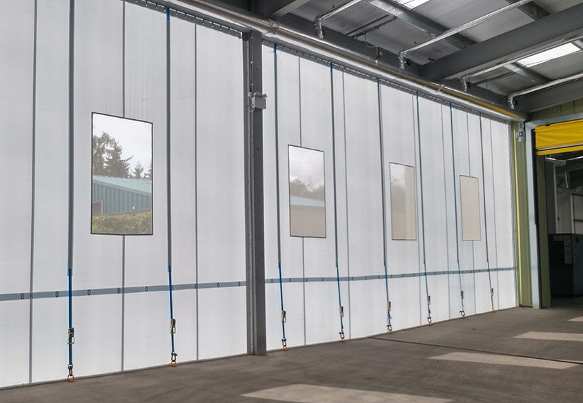 Industrial partitions for production drive-through area | Images