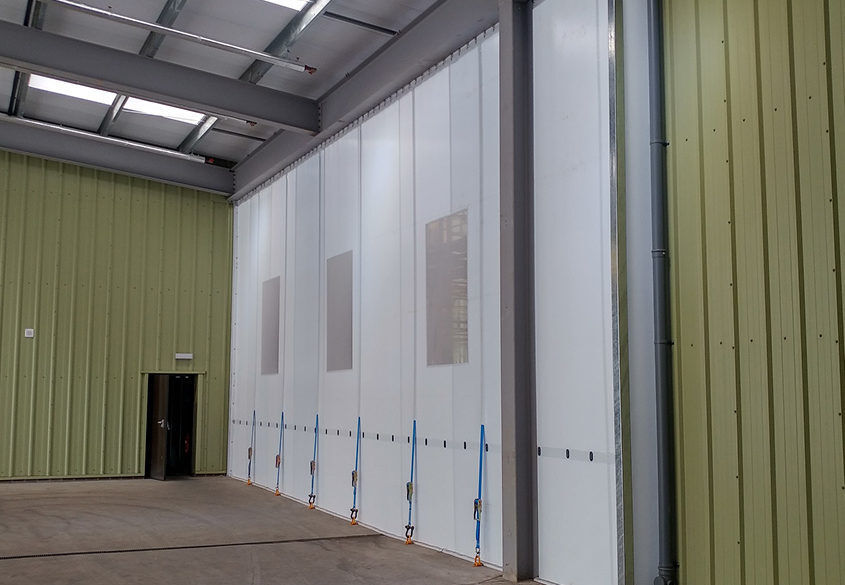 Industrial partitions for production drive-through area | Images