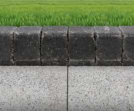 Tegula Kerb Large (TKL) Tumbled Block Paving Kerb | Tobermore | ESI ...