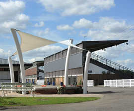 Sydney – hyperbolic tensile white shade sail | Broxap | ESI External Works