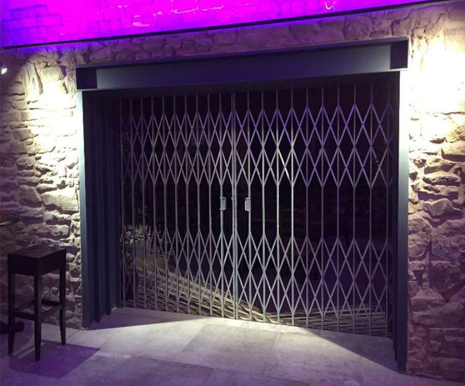 Collapsible custom-made galvanised steel security gates | Bolton Gate ...