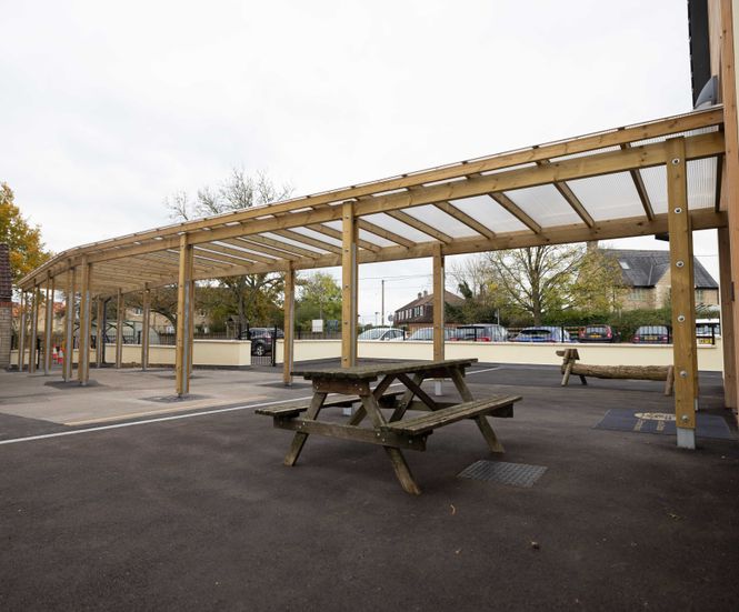 Canopy shelters and covered walkway for primary school extension ...