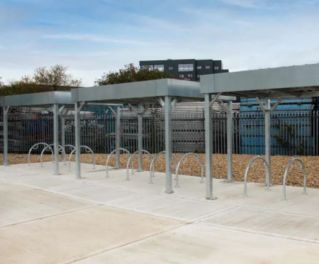 Cycle shelters with green roofs for upgraded warehouse space ...