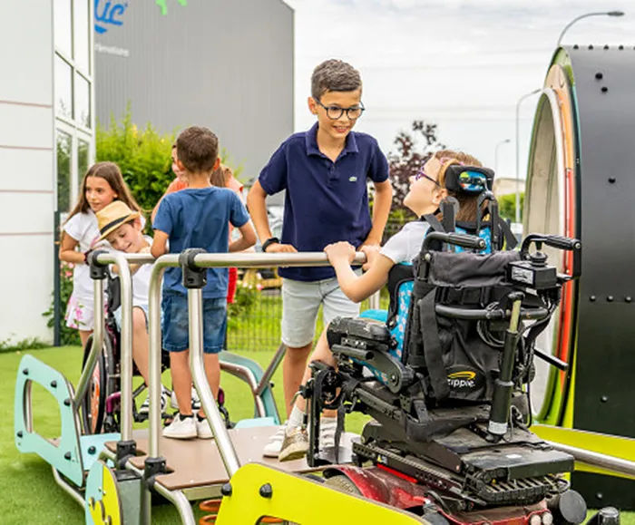 Springer wheelchair-accessible seesaw - J987® | Images