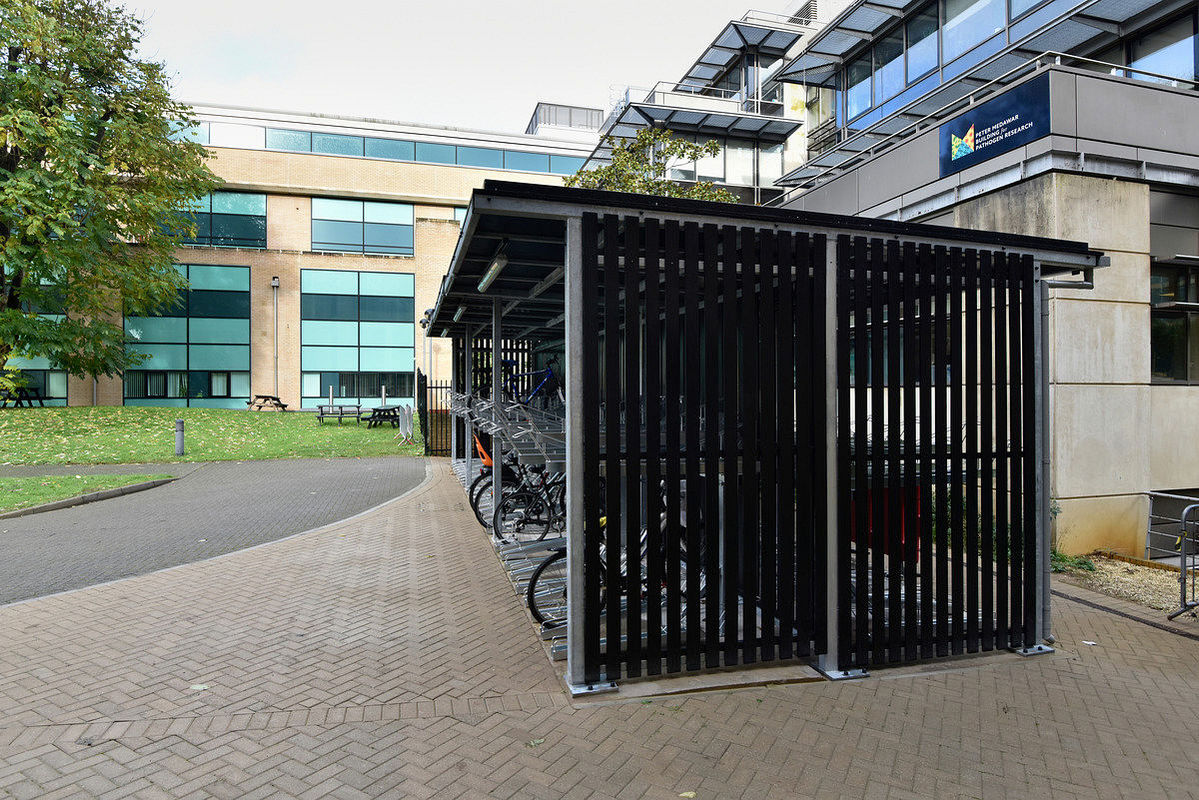Green roof cycle shelter and 2-tier bike racks for university | Images