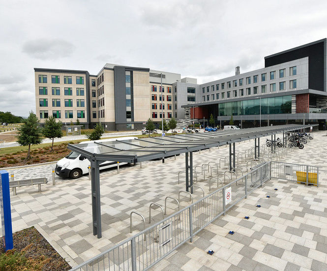 Bespoke canopies, cycle shelter and litter bins for new hospital | Broxap