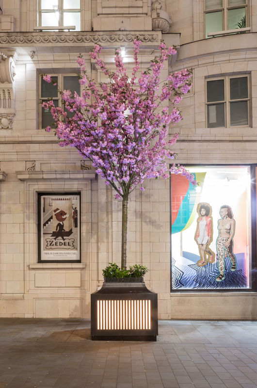 Bespoke bronze illuminated tree and movable planters | Images