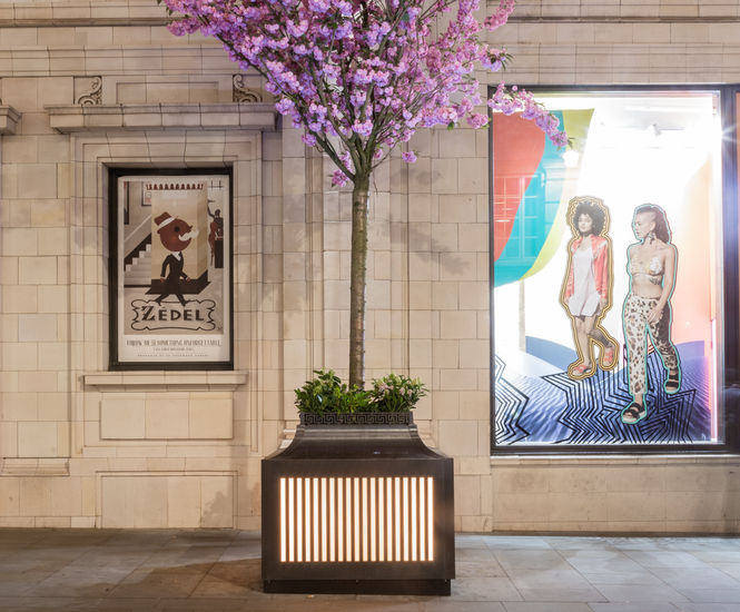 Bespoke bronze illuminated tree and movable planters | Urban Street ...