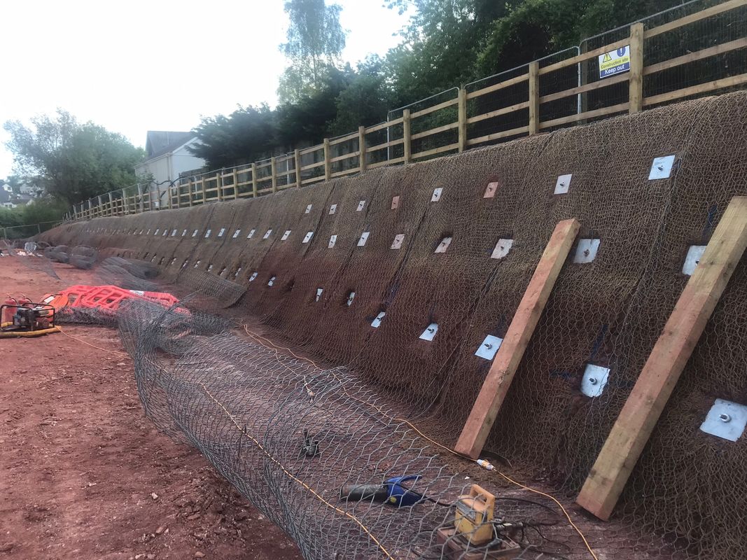 Earth anchors stabilise 6m-high, 137m-long slope at business park | Images