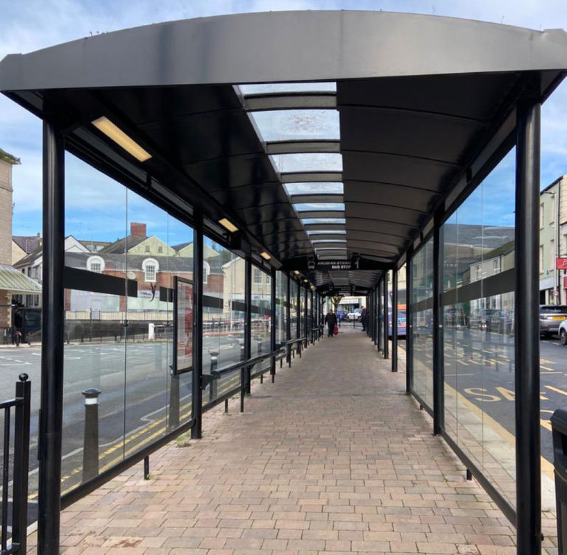 Bus passenger covered walkway with wildflower green roof | Images