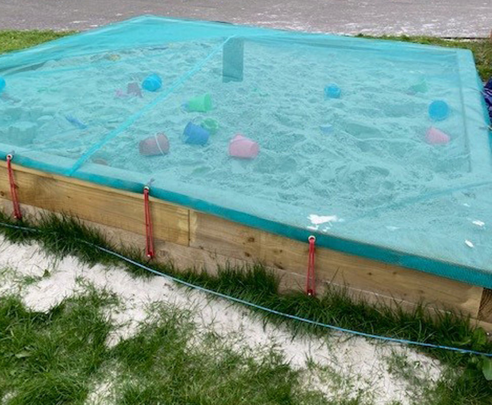 Large square timber sand pit | Images