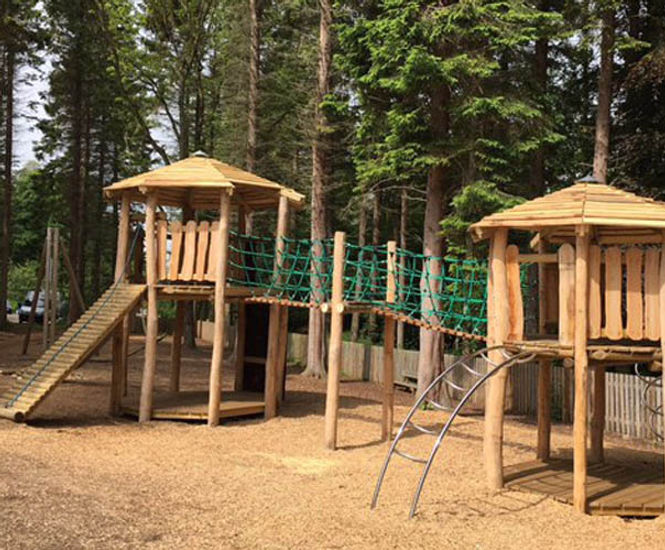 Natural timber play towers - Brodie Castle, Moray | Caledonia Play