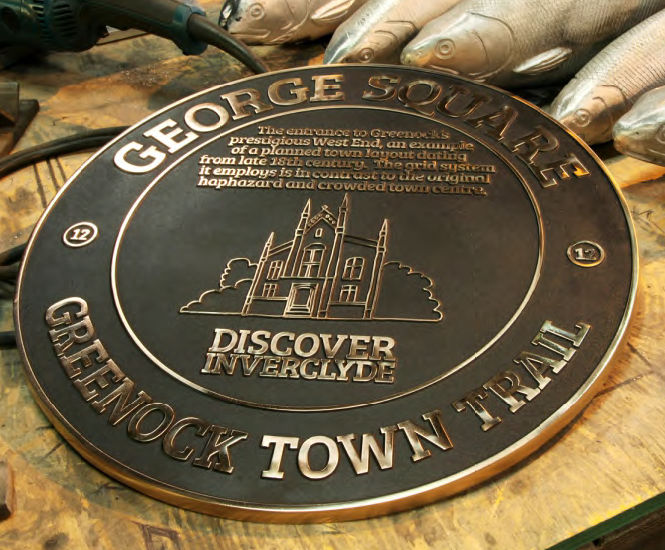 Cast bronze trail markers for pavements | Leander Architectural