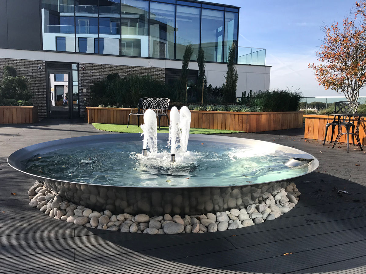 Stainless steel water feature with jets - Chelsea Island | Fountains ...