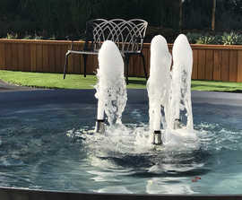 Stainless steel water feature with jets - Chelsea Island | Fountains ...