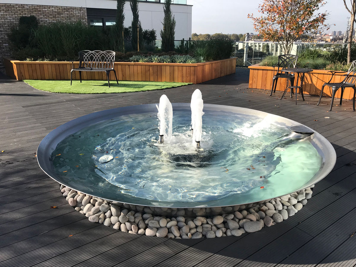 Stainless steel water feature with jets - Chelsea Island | Fountains ...