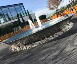Stainless steel water feature with jets - Chelsea Island | Fountains ...