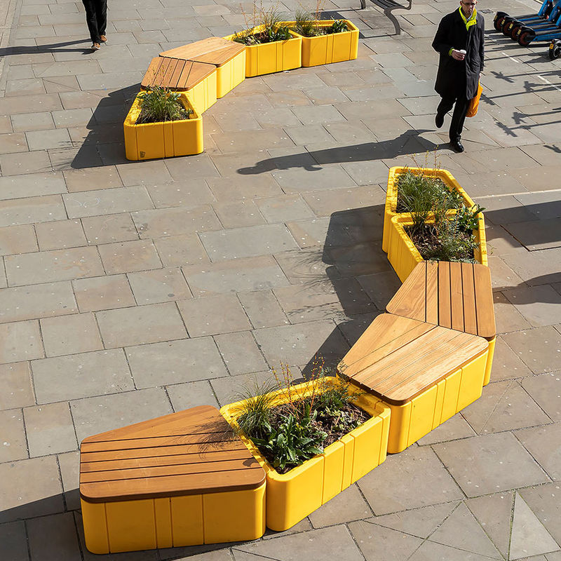 Colourful seating and planters transform public realm | Images