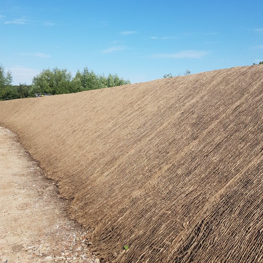 Erosion control for a steep sloped bund in Warwickshire | Greenfix Soil ...