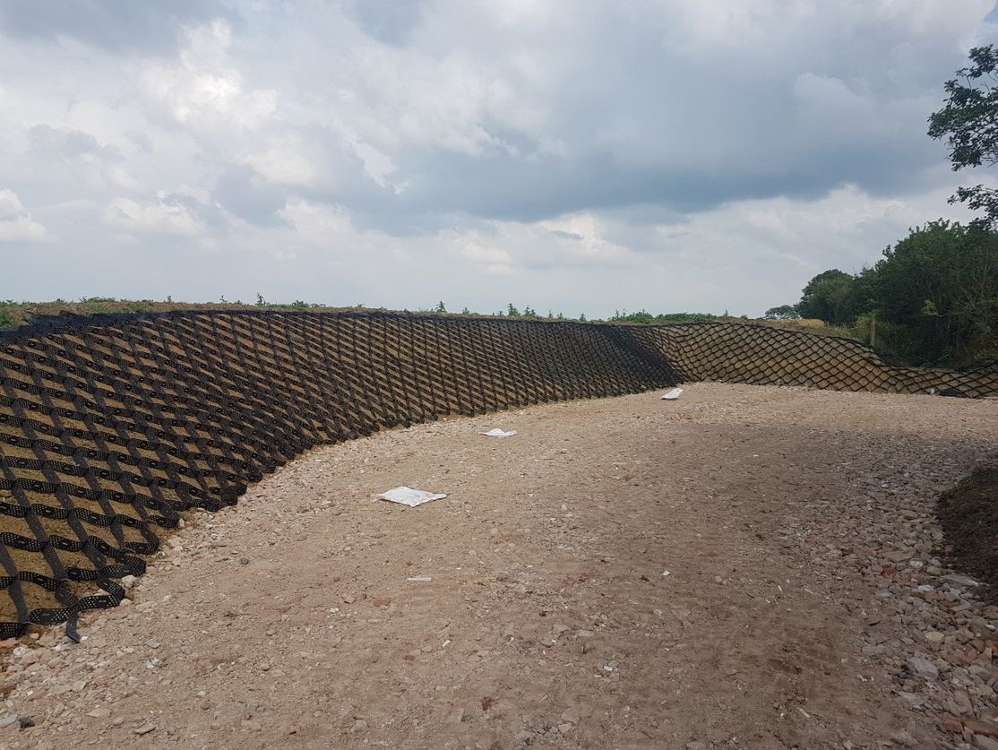 Erosion control for a steep sloped bund in Warwickshire | Greenfix Soil ...