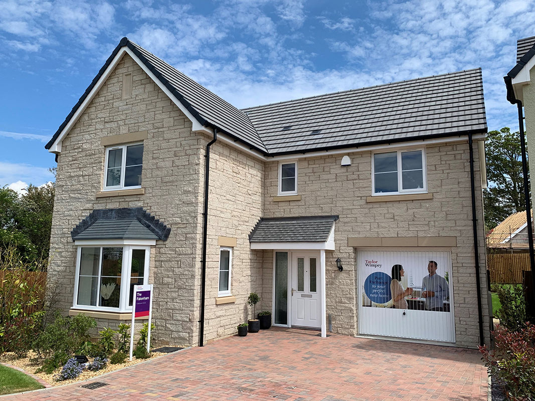 Darlstone - reconstructed buff stone walling | Images
