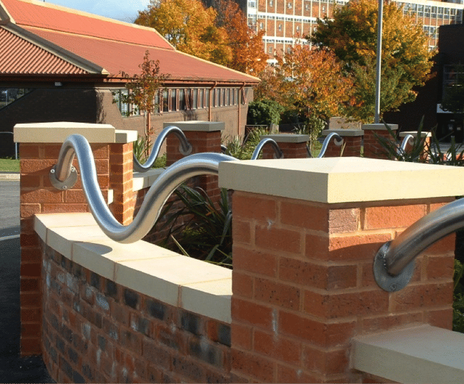 Retrofit of bespoke eccentric stainless steel rails | Architectural ...