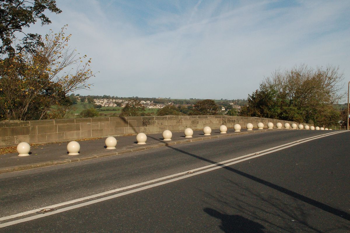 Images for Recycled spherical bollards over The River Aire