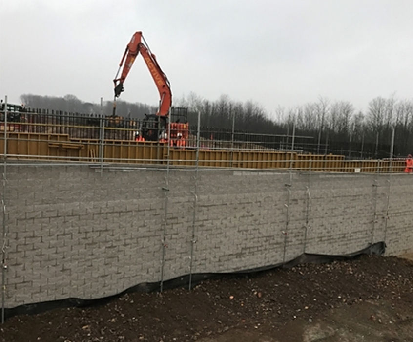 Retaining wall and reinforced soil slope for A21 road | Images