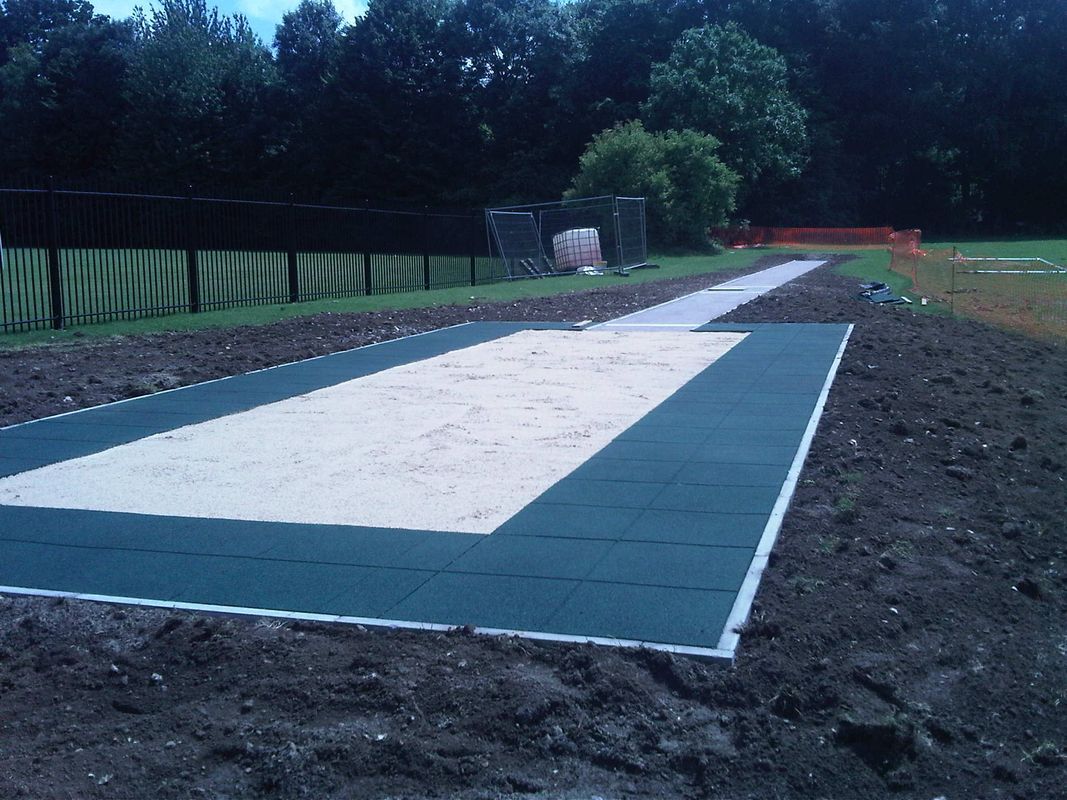 Long jump sandpit construction | Images