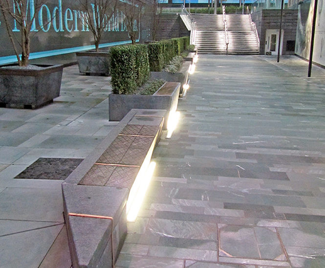Lighting columns and bespoke seating - NOMA public realm | Woodscape