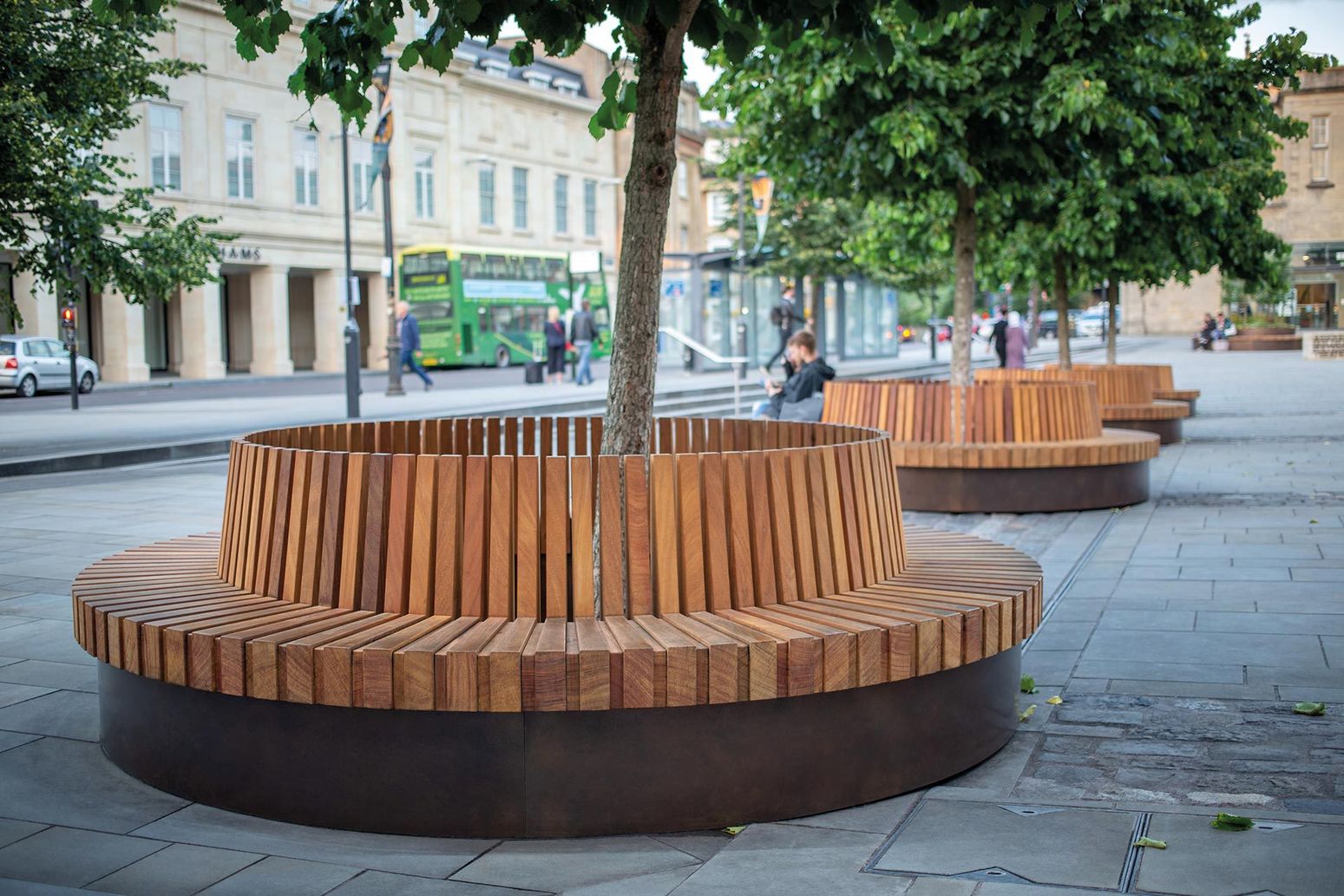 Movable circular hardwood tree seats for public realm | Woodscape | ESI ...