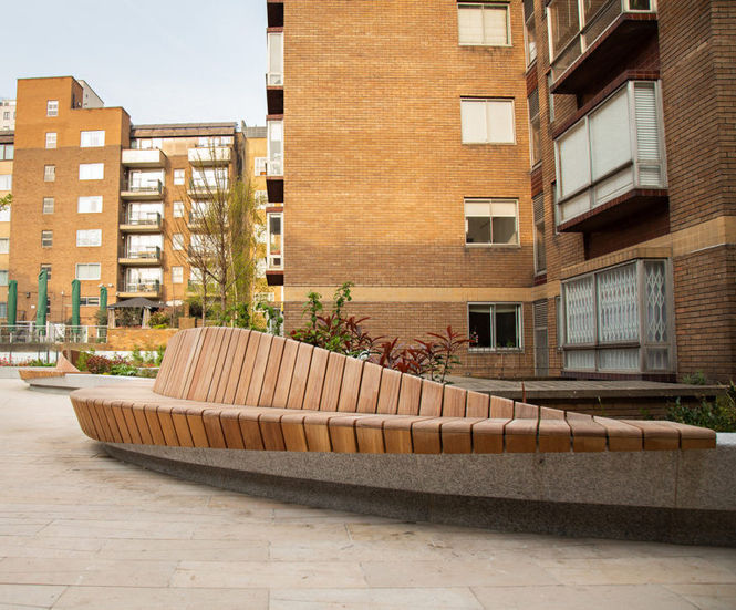 Bespoke curved timber and granite seating - Halkin Arcade, London ...