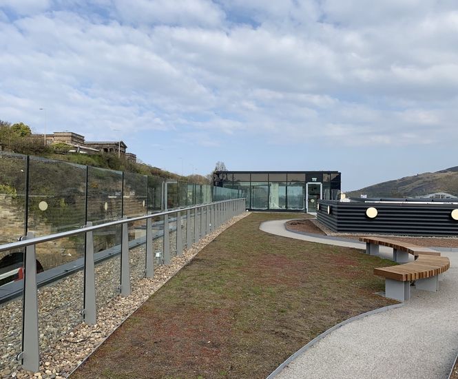Curved benches for roof terrace - HMRC, Edinburgh | Benchmark Design