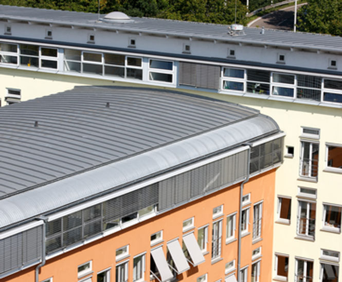 Corrugated profile roofing and cladding for office block | RHEINZINK