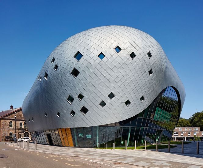 Zinc cladding for roof and facade of futuristic building | RHEINZINK