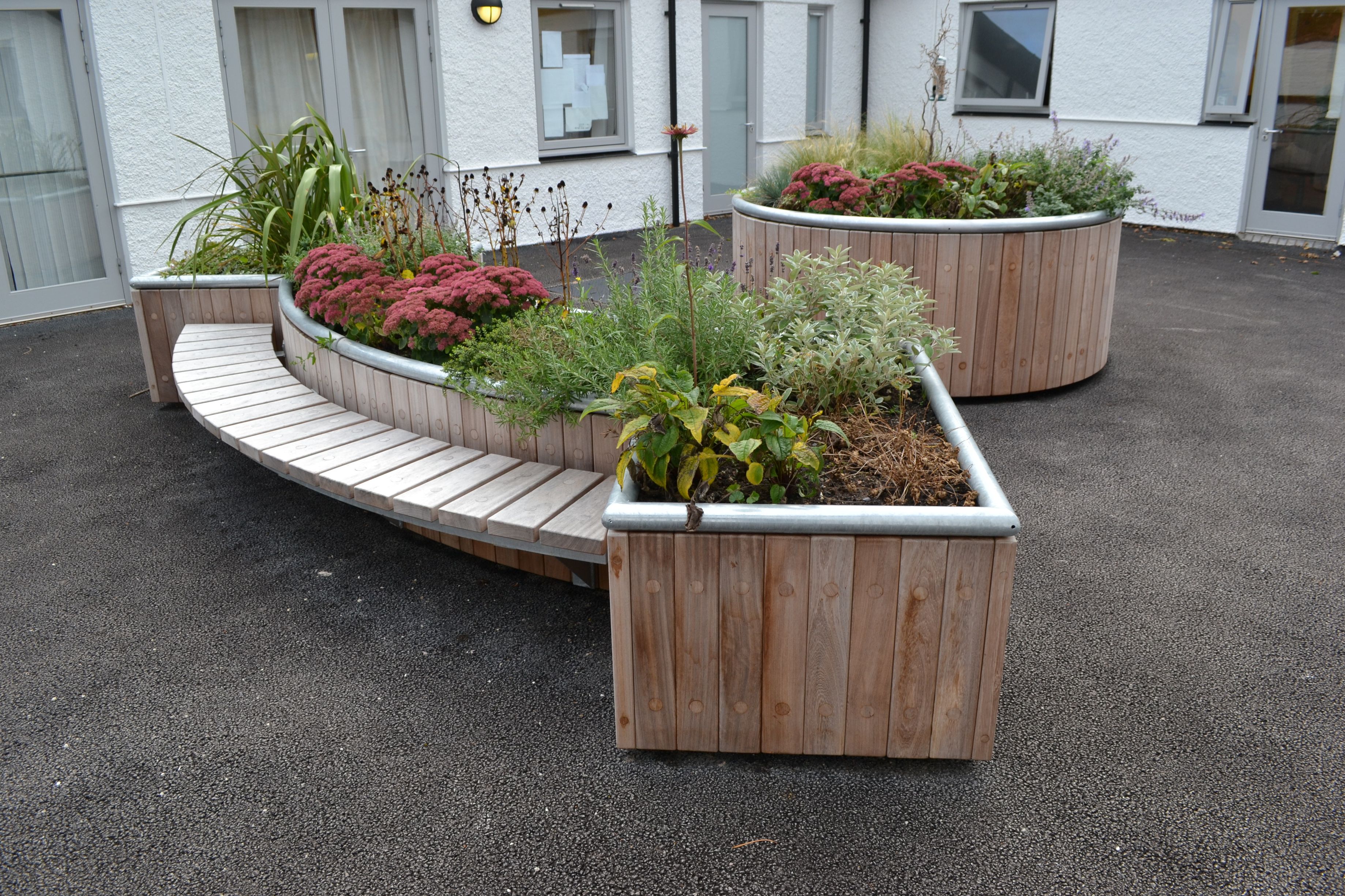 Planters with integrated seating | Street Design | ESI External Works