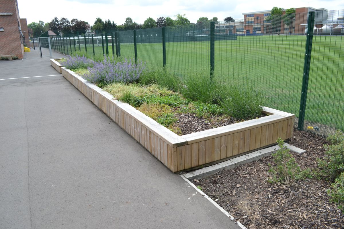 Planters with integrated seating | Street Design | ESI External Works