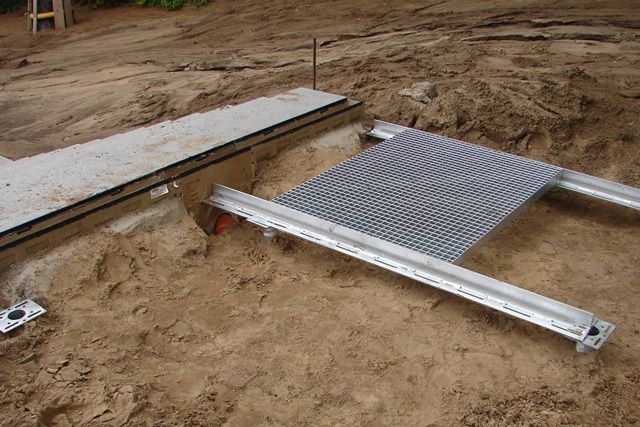 Root bridge for stairway construction near trees | Images