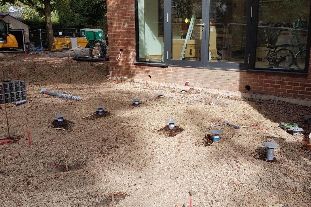 Carport built over RPA using tree root bridge | Green Grid Systems ...