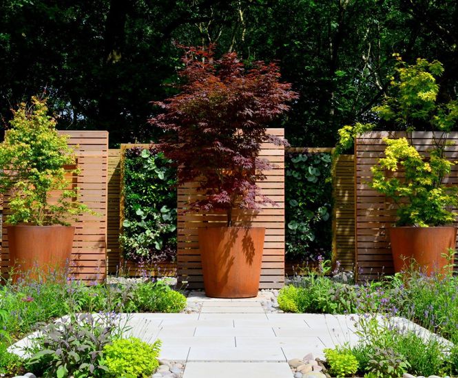 Cado contemporary corten steel circular planter | Taylor Made Planters