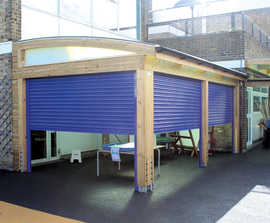 Two roller-shutter canopies | Setter Shelters | ESI External Works