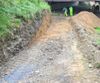 Rootlok system for vegetated retaining wall on footway | GeoGrow