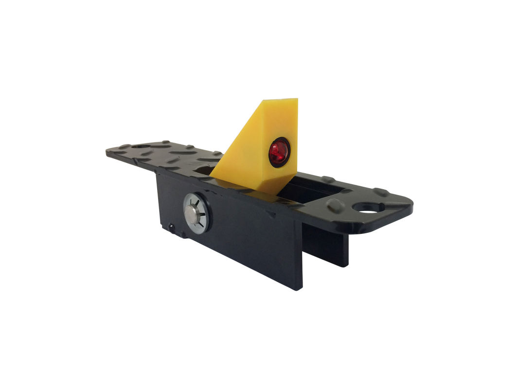 Directional traffic flow plate with raised fins and reflective studs ...