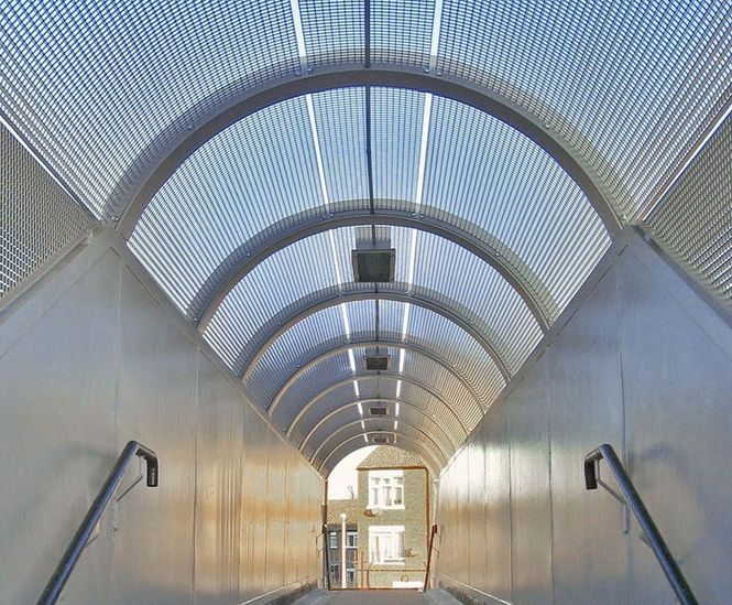 Robust railway bridge cladding, London Borough of Newham | Lang+Fulton